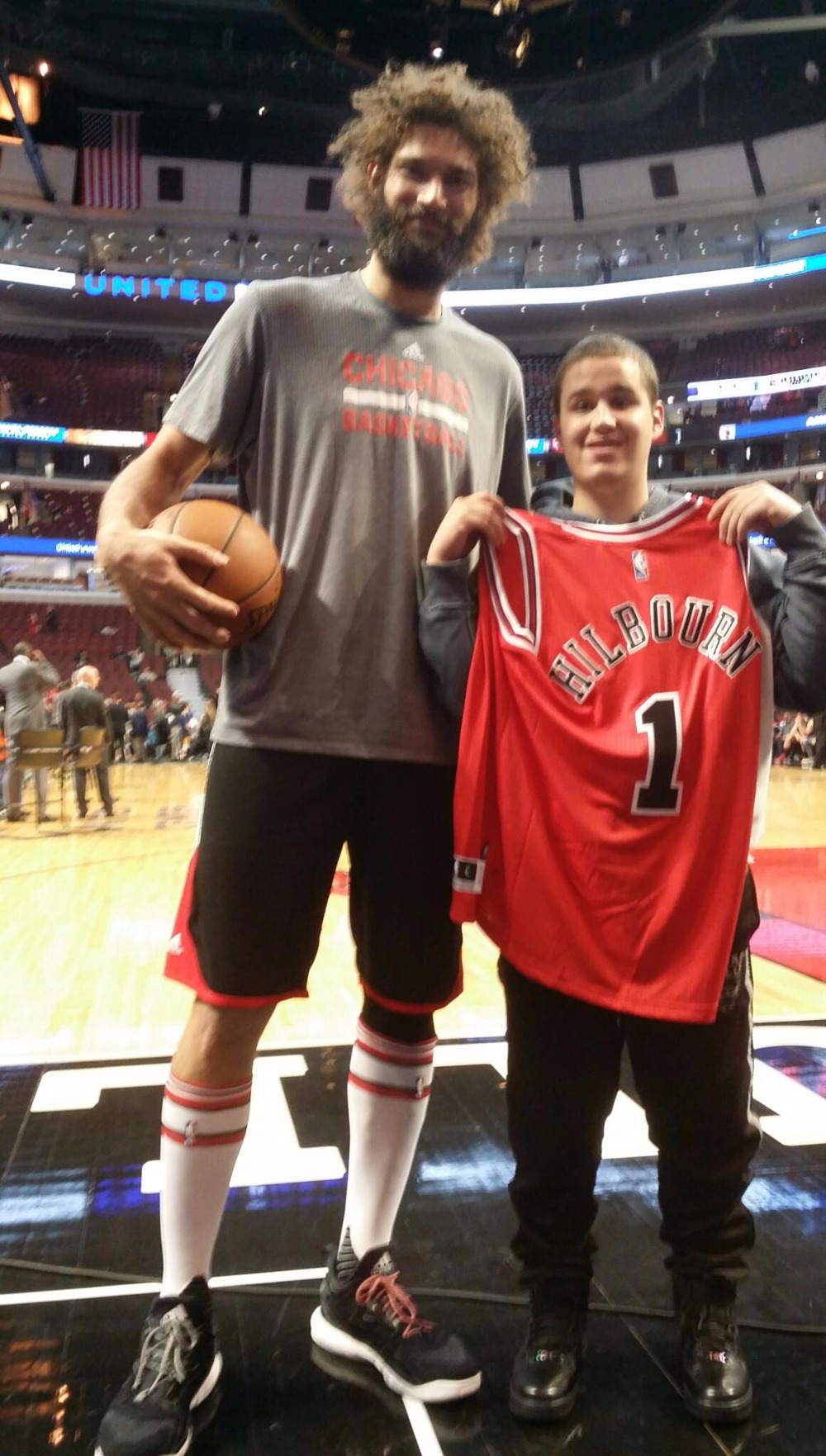 Robin Lopez with Austin Hilbourn after the Chicago Bulls reached out ...